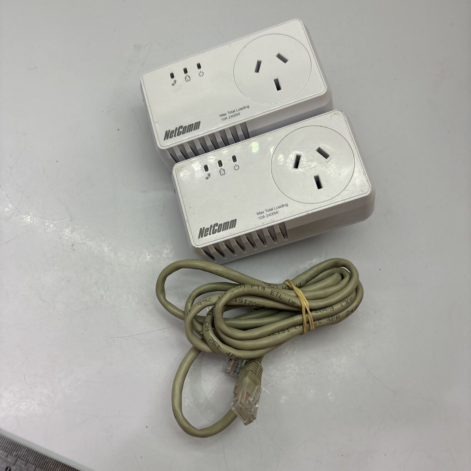 2x NetComm NP204 Powerline Adapter With AC Passthrough – Retro Unit