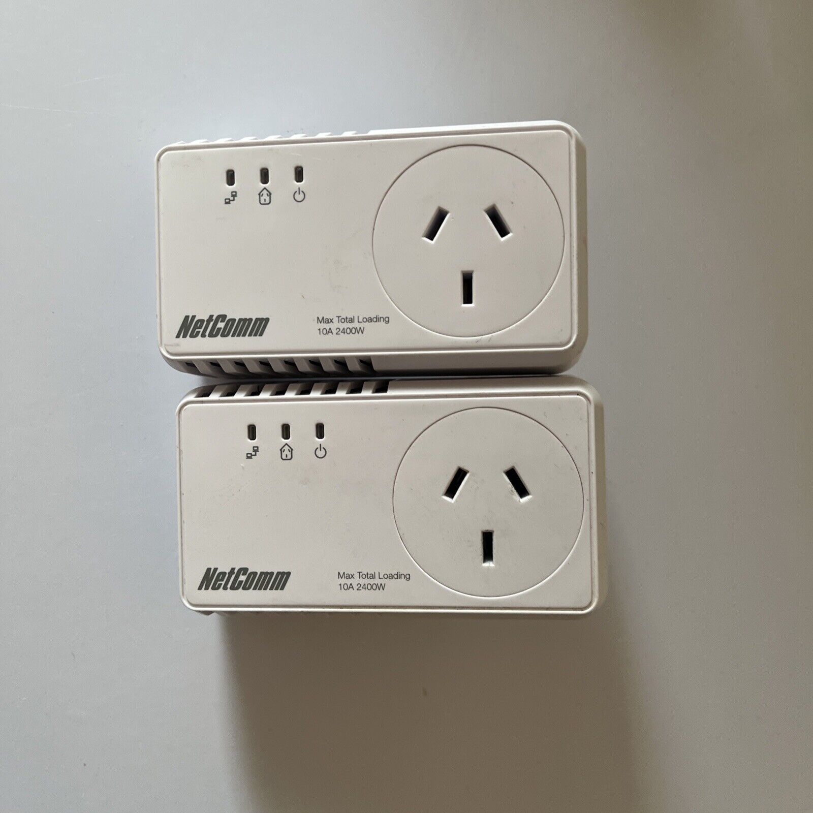 2x NetComm NP204 Powerline Adapter With AC Pass-Through – Retro Unit