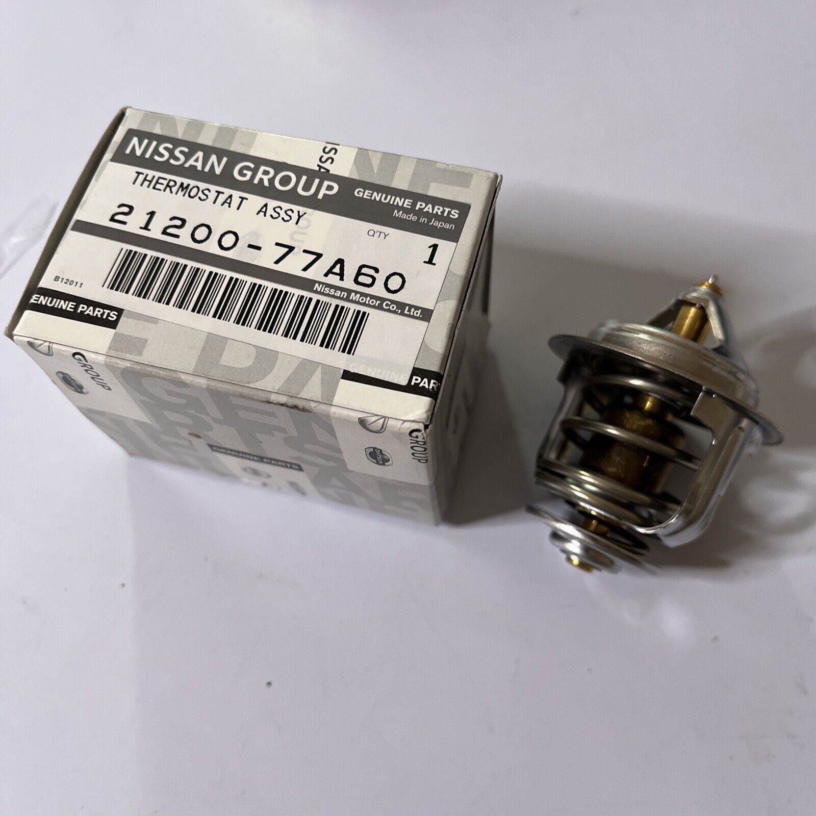 Genuine Nissan Thermostat Assy 21200-78A60 – Retro Unit