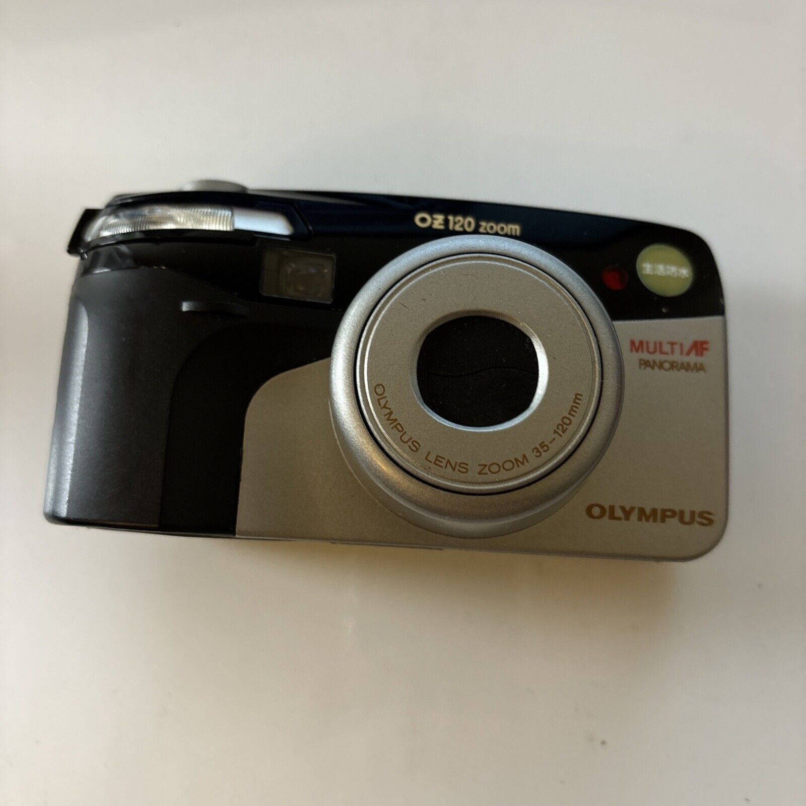 Olympus OZ 120 Zoom Multi AF Film Camera 35mm Silver Black – Retro Unit