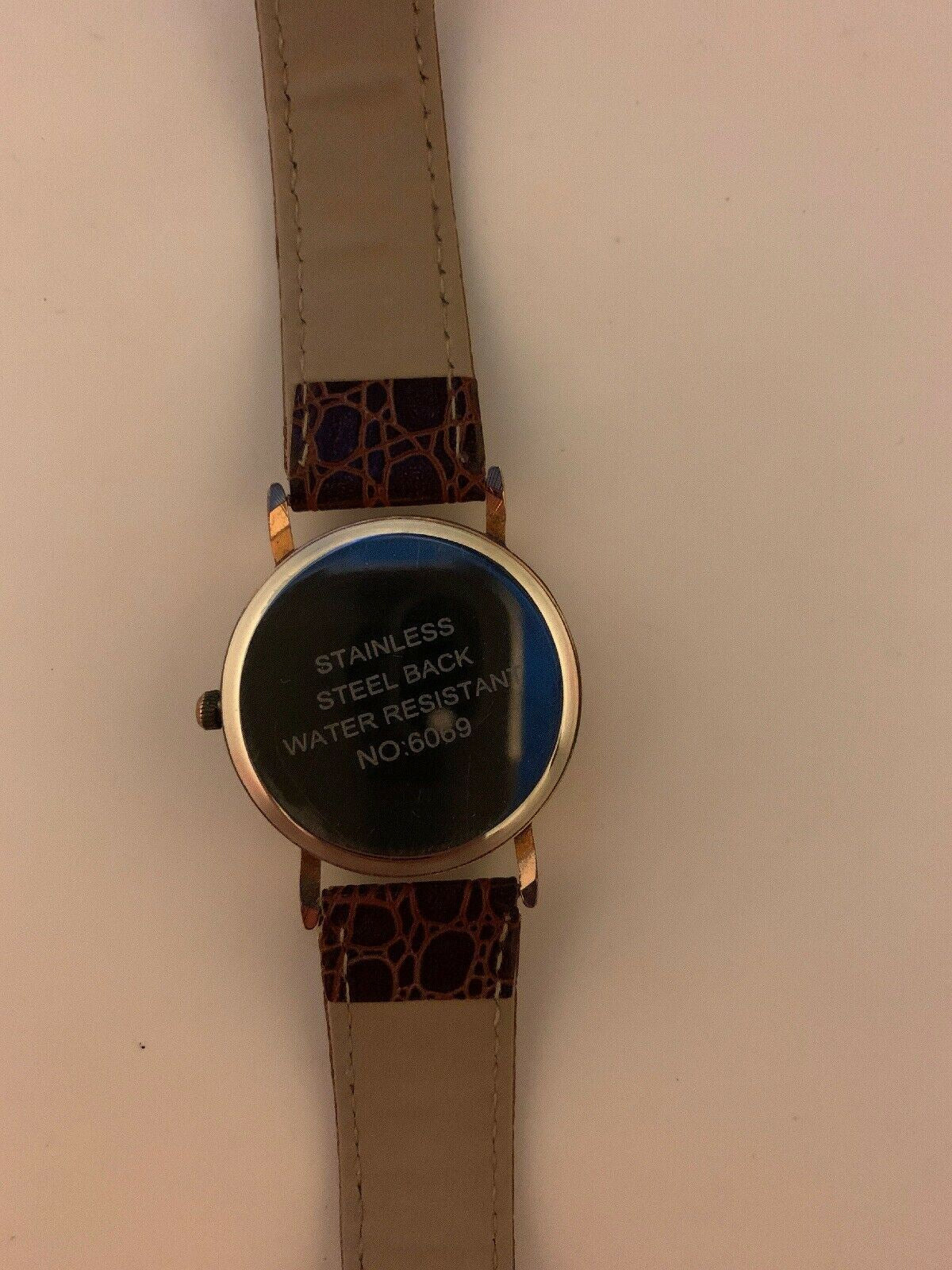 SWC Stainless Steel Back Water Resistant Analogue Watch 6069 – Retro Unit